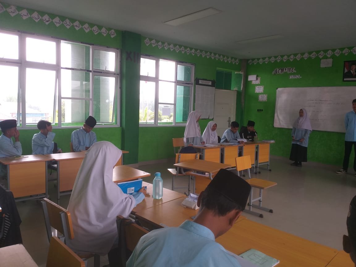 RAHMI HALISMAWATI, S.S - Website MAN 2 Agam